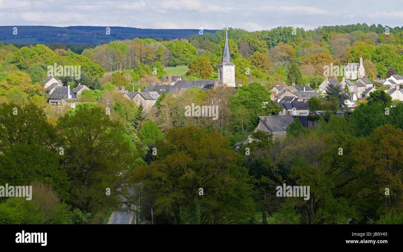 French village in a green setting, in spring (St Fraimbault, Northern ...