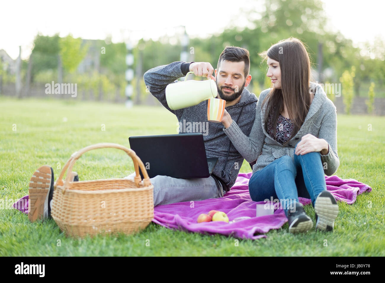 Love couple picnic in park Stock Photo - Alamy