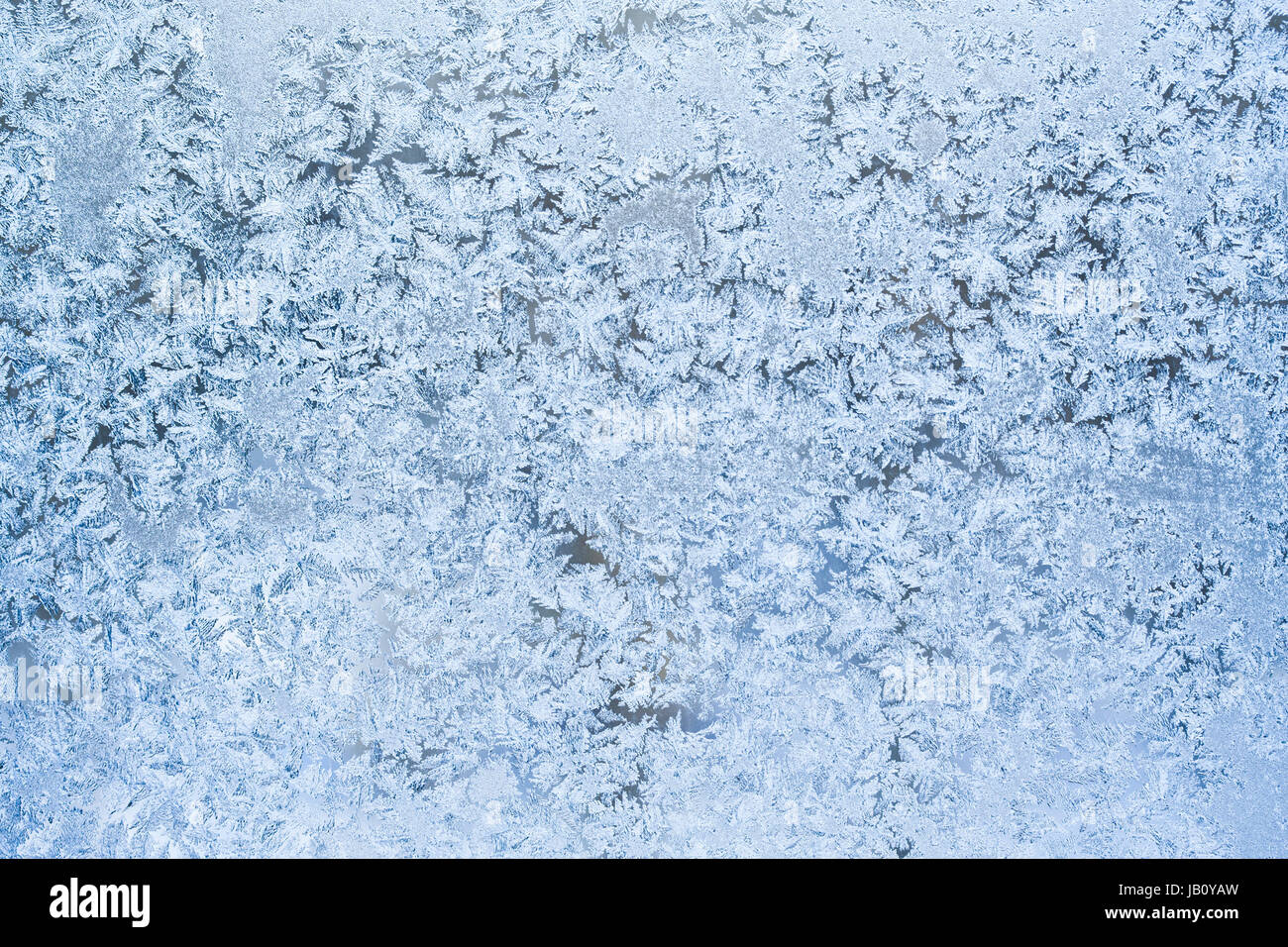 Beautiful pattern of frost on winter window Stock Photo - Alamy