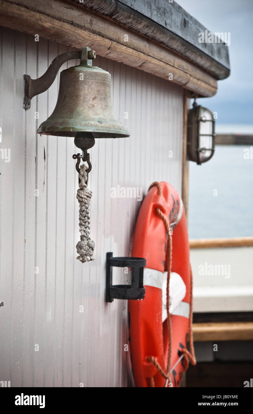 ship's Bell on an old sailboat Stock Photo - Alamy