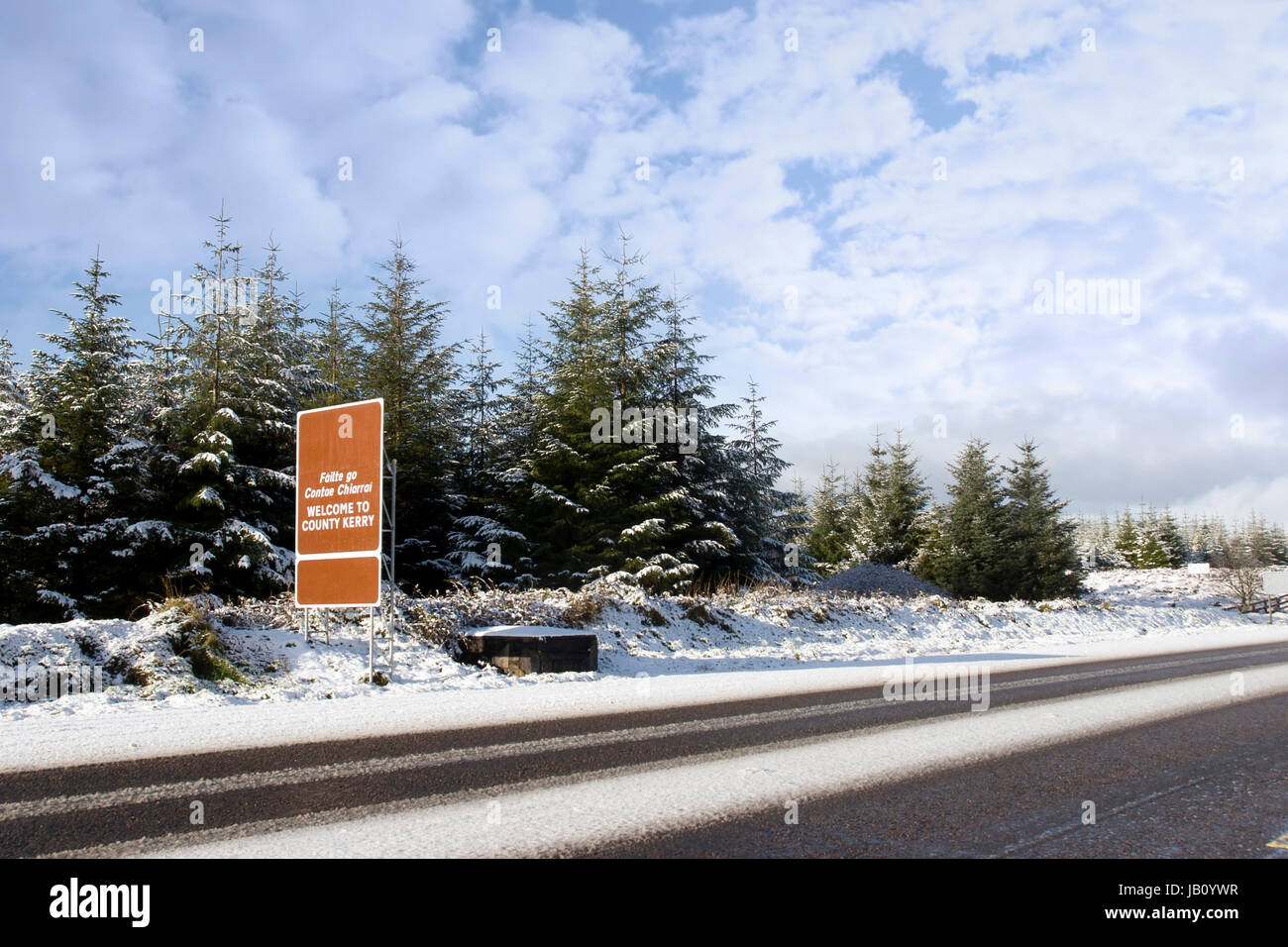 welcome to Kerry road sign in snow scene in irish speaking area of ...