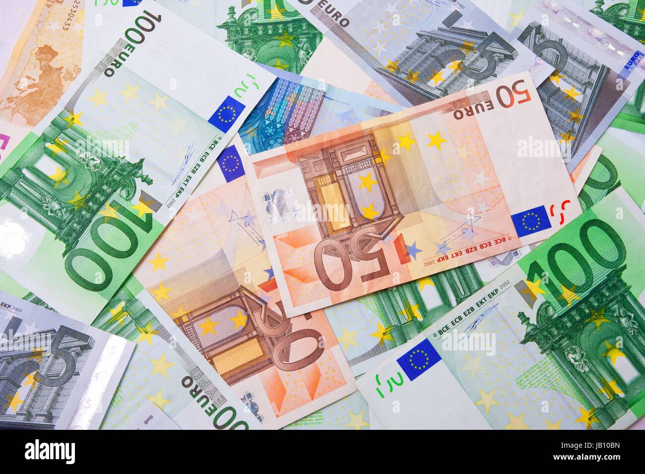 Many euro banknotes making european currency background Stock Photo - Alamy