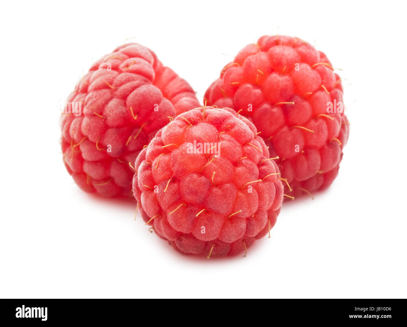 Ripe red raspberries isolated on white background Stock Photo - Alamy
