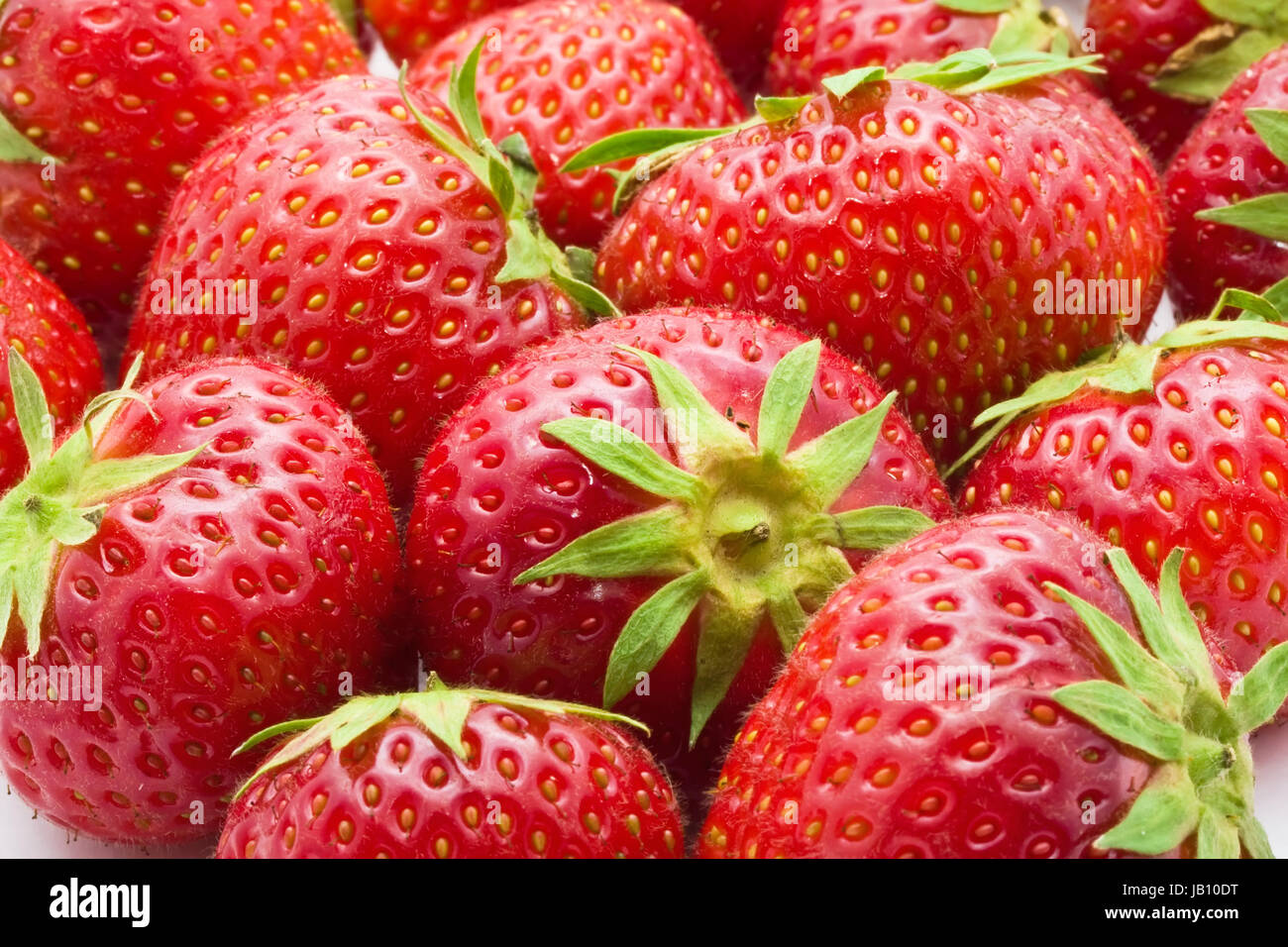 Red sweet strawberries making nice edible background Stock Photo - Alamy