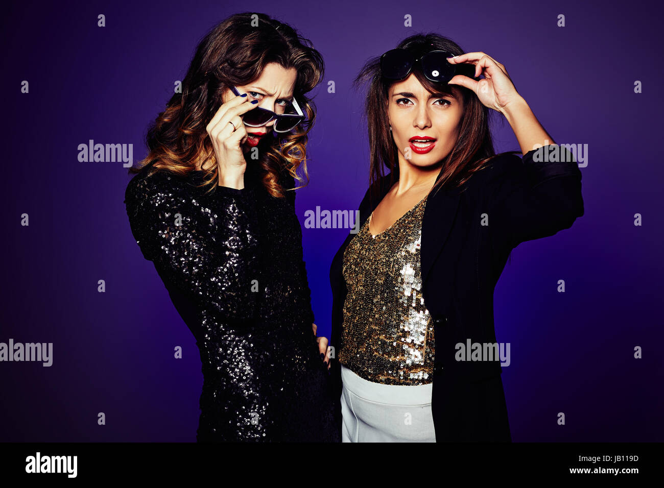 Studio Shot of Indignant It Girls Stock Photo - Alamy