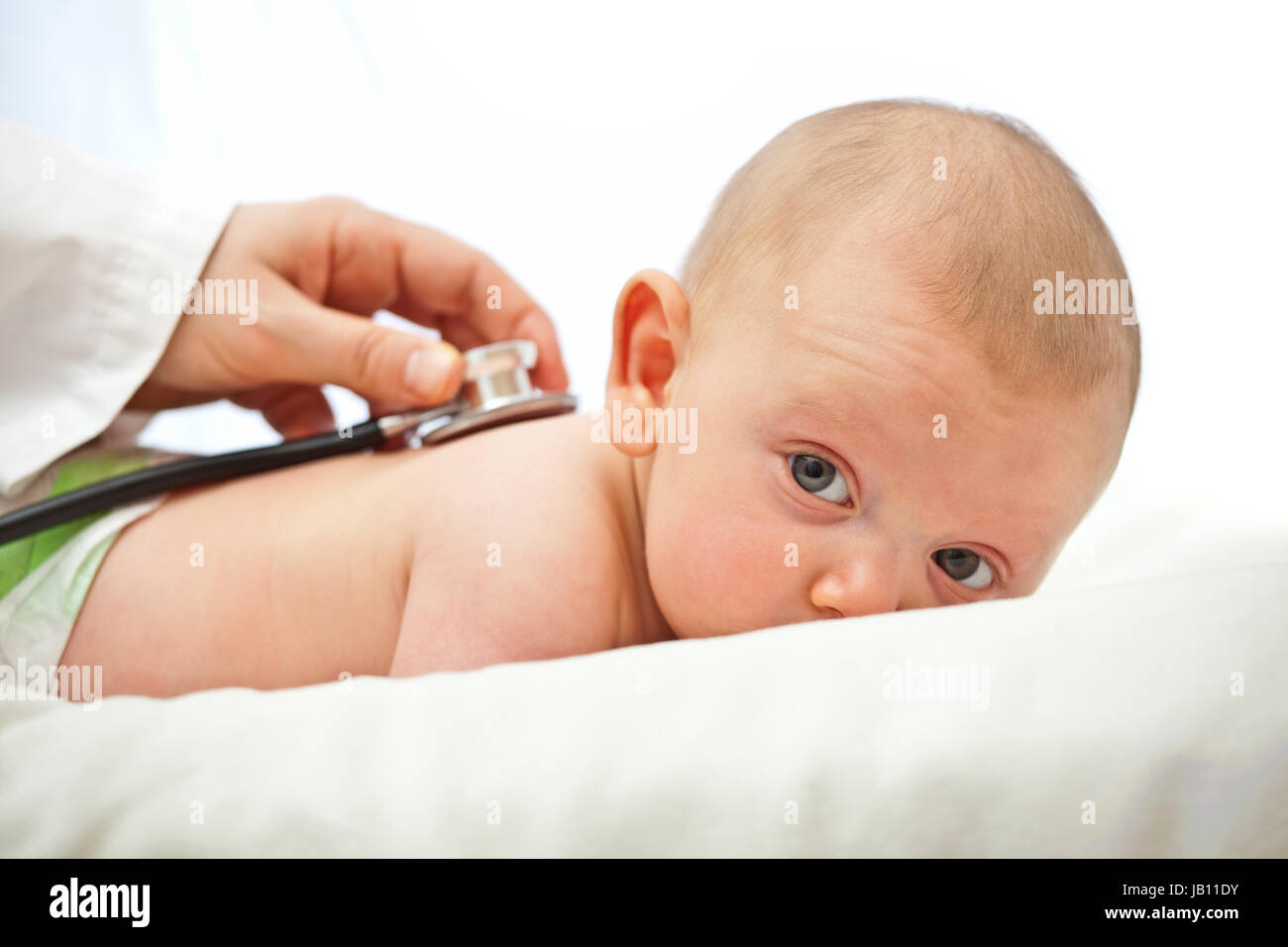 baby portrait and pediatrician check Stock Photo - Alamy