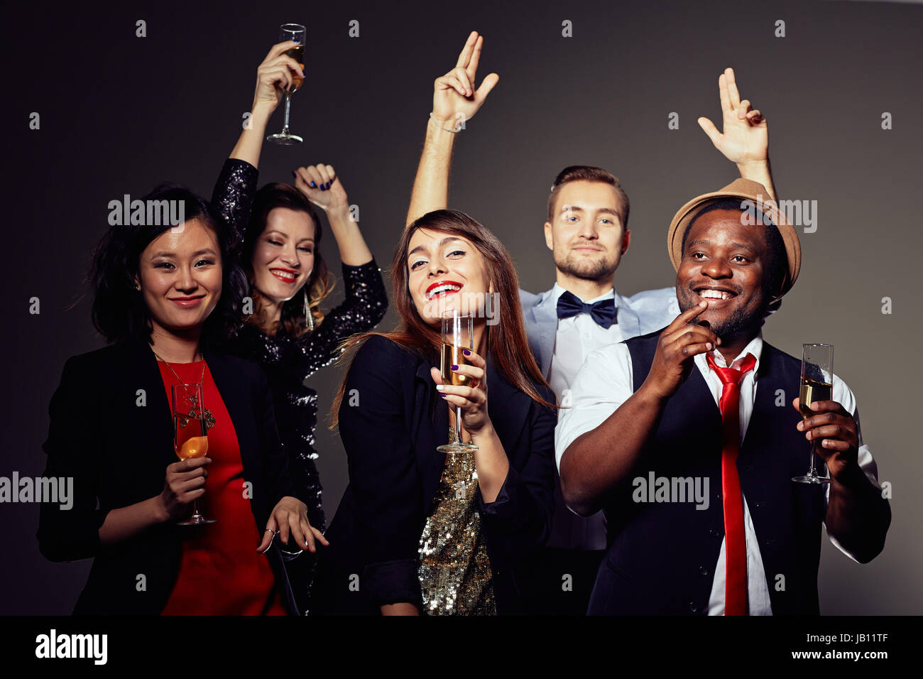 Enthusiastic Young Friends Clubbing Stock Photo - Alamy