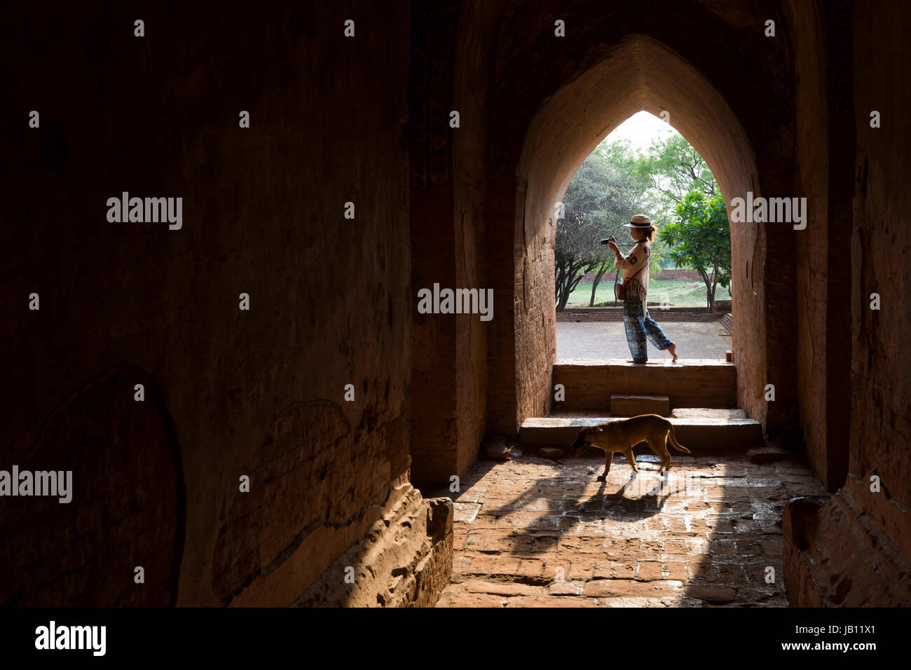 Woman inside Dhammayangyi Pagoda, an ancient temple in Bagan, Myanmar ...
