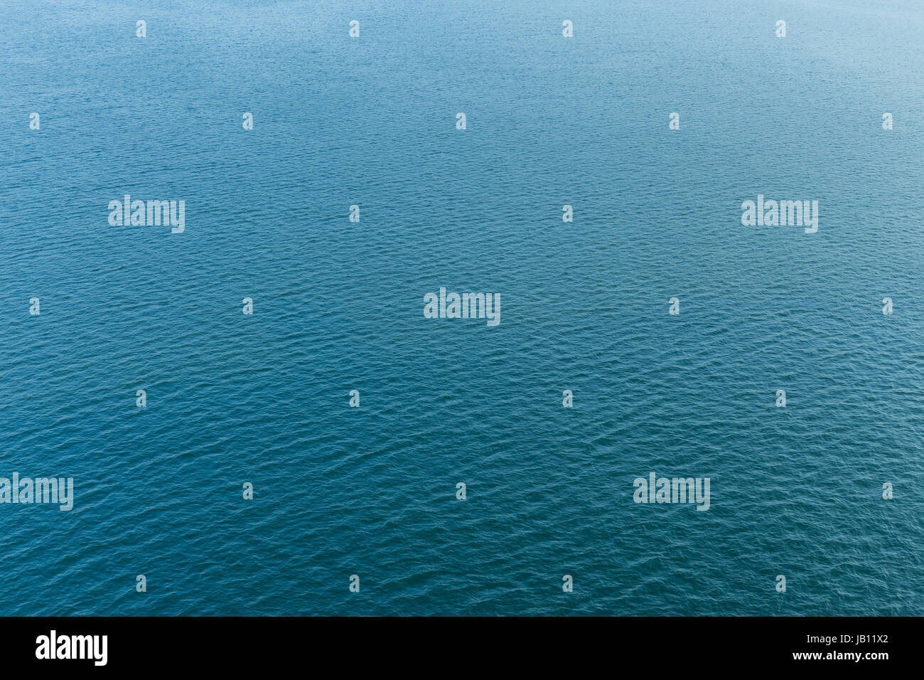 Rippling blue water surface Stock Photo - Alamy