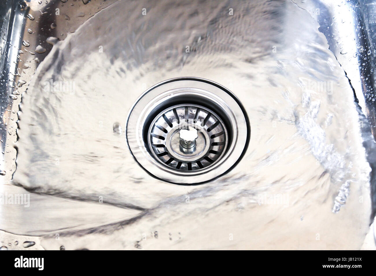 A kitchen sink with drops Stock Photo - Alamy