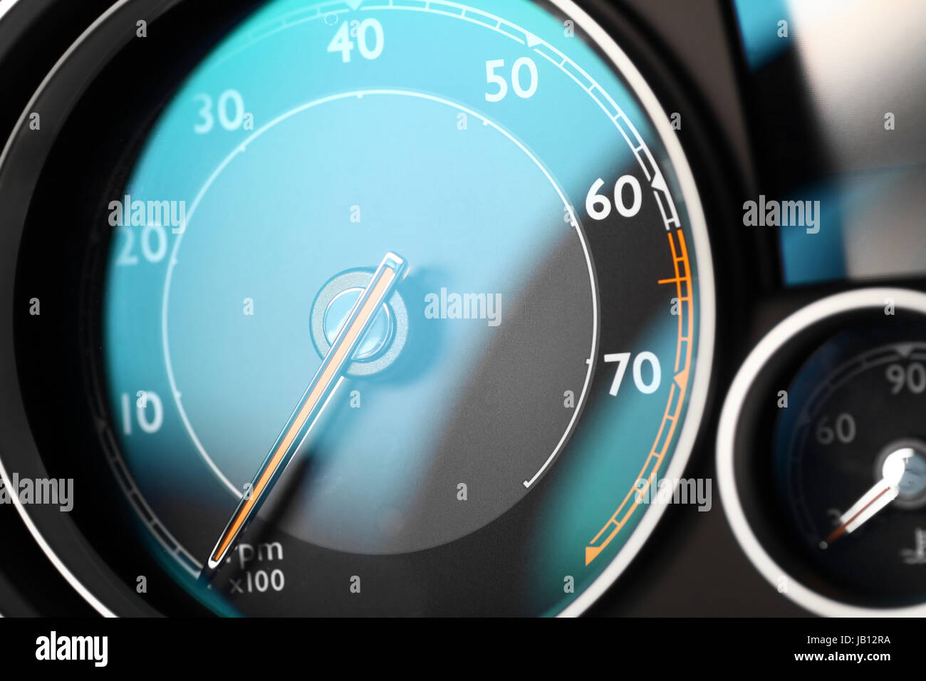Detail of a tachometer in a car Stock Photo - Alamy