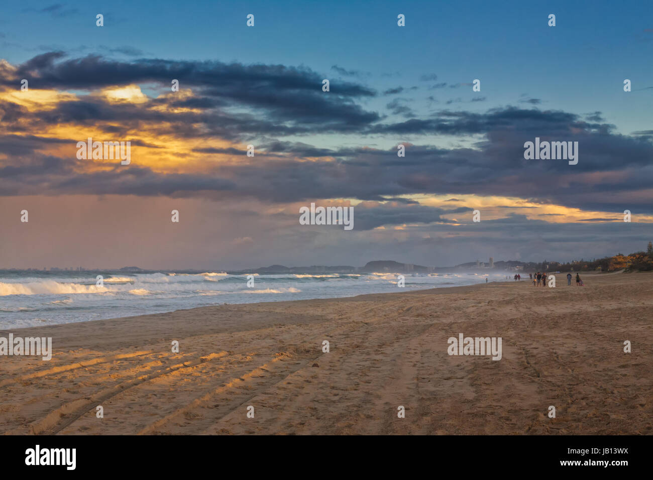 A beautiful sunset on a beach at the city of Gold Coast in Queensland ...