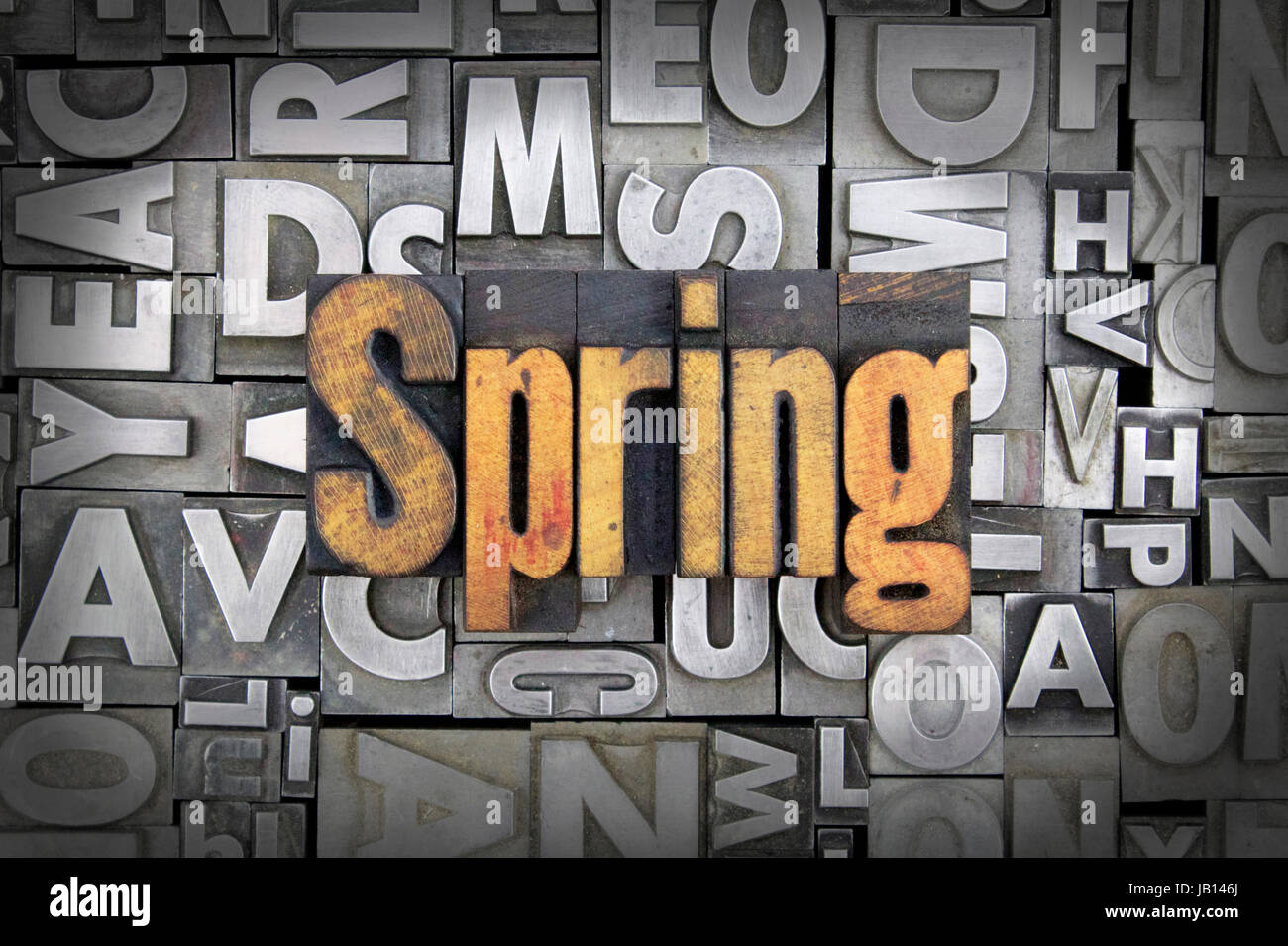 Spring written in vintage letterpress type Stock Photo - Alamy