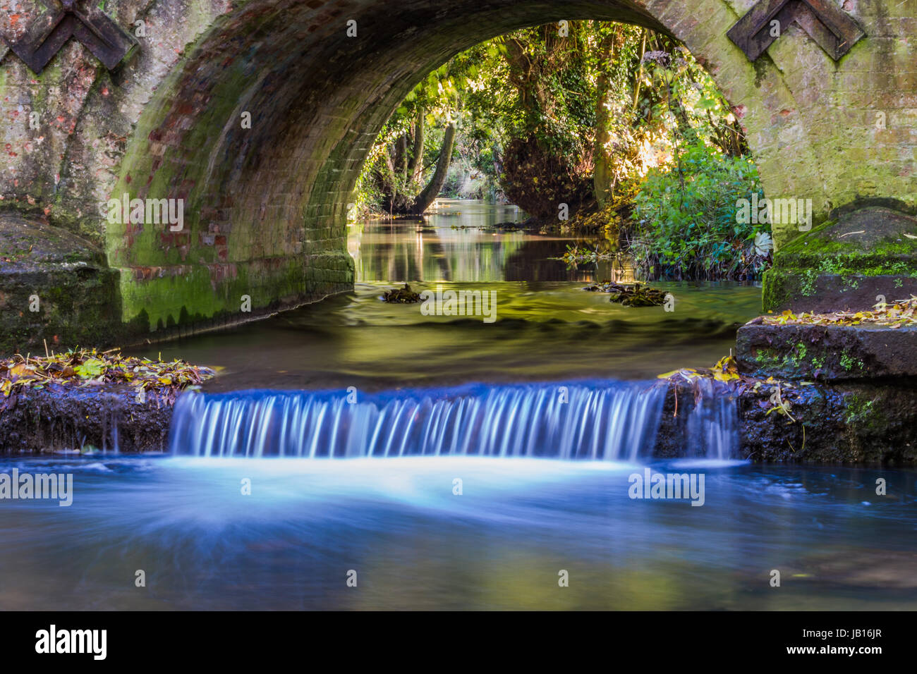 River Tiffy waterfall flowing over weir at Wymondham Stock Photo - Alamy