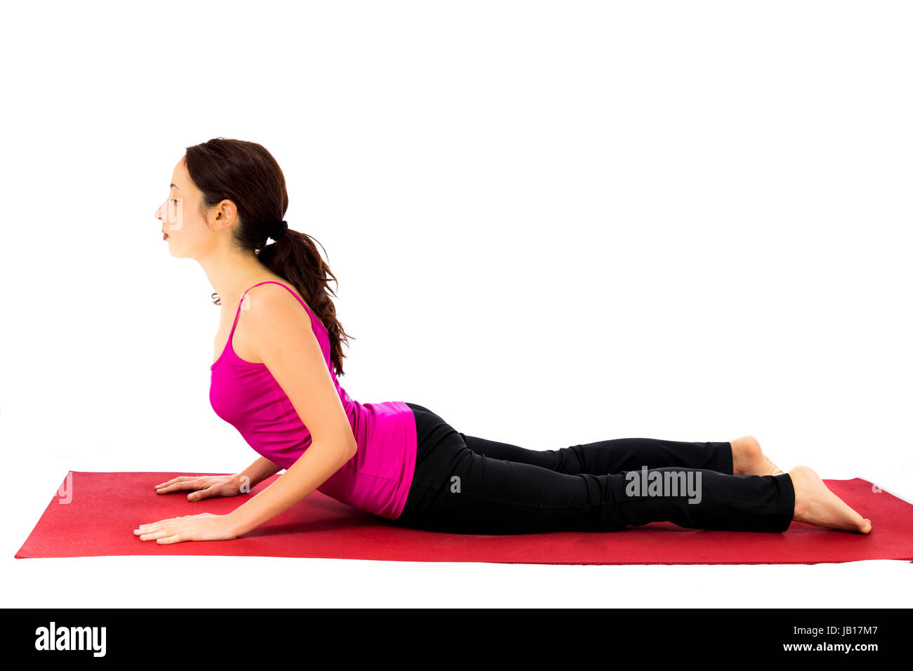 Woman doing Cobra pose for stretching (Series with the same model ...
