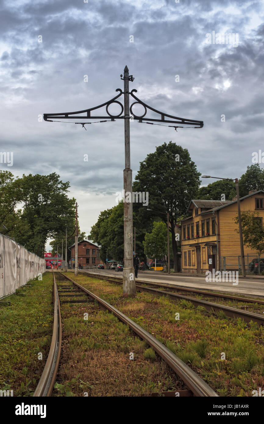 Old rails of a tram line in the Kalamaja area in Tallinn, Estonia. The ...