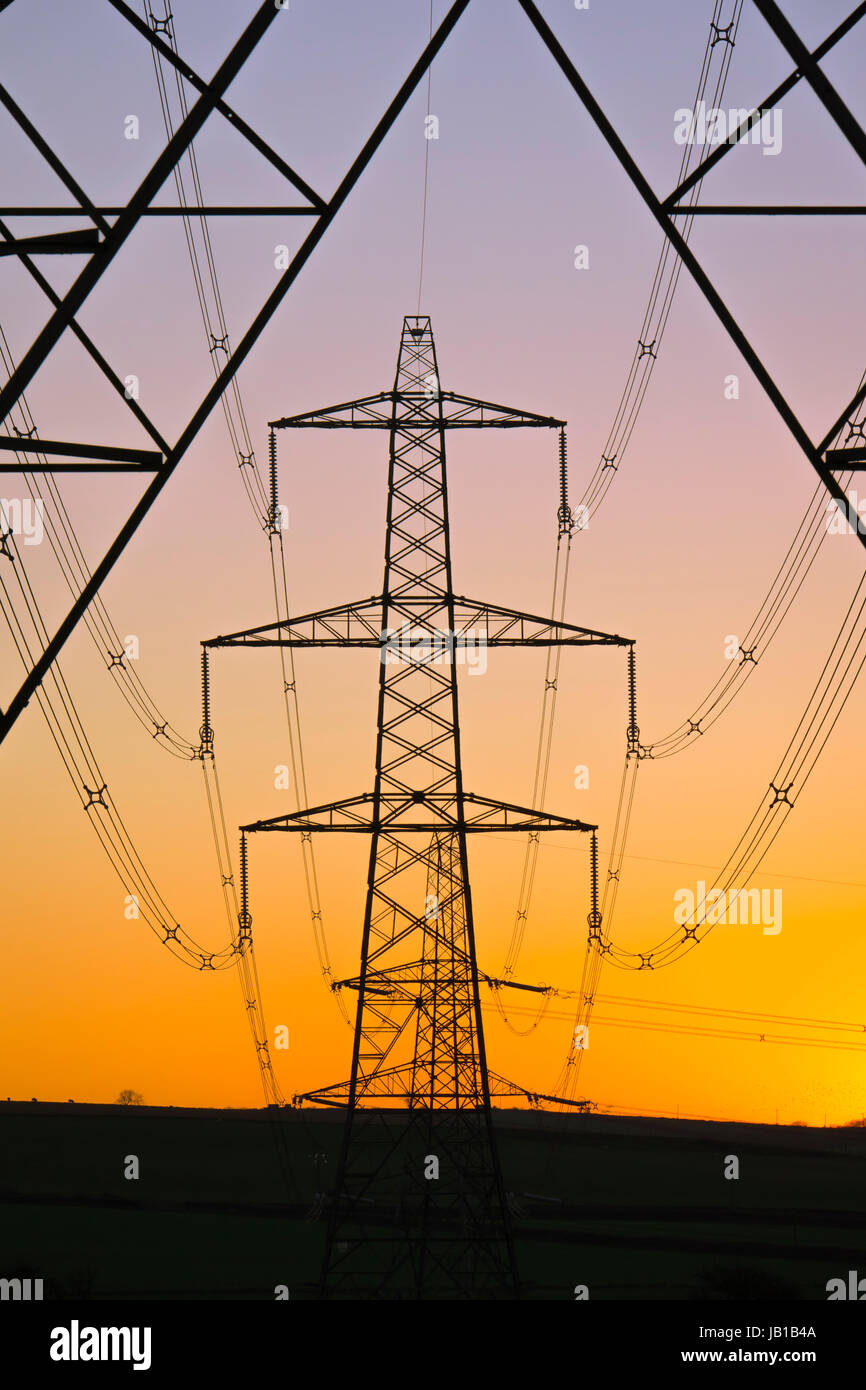 An electricity pylon of the National Grid in Wales at sunset Stock ...
