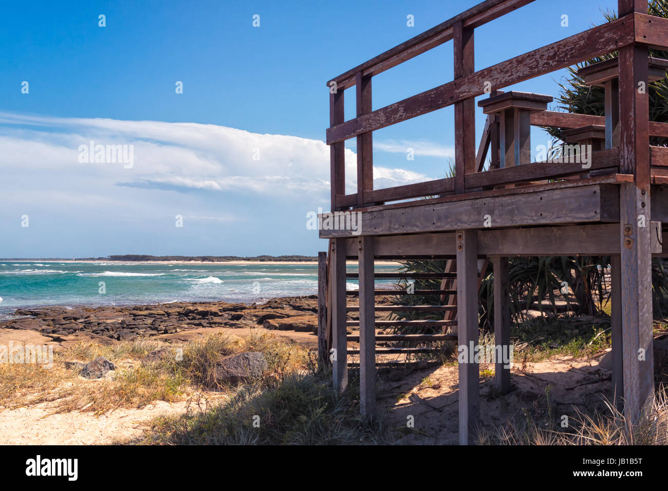 The wooden stairs lead from the boardwalk to the beach at Caloundra ...