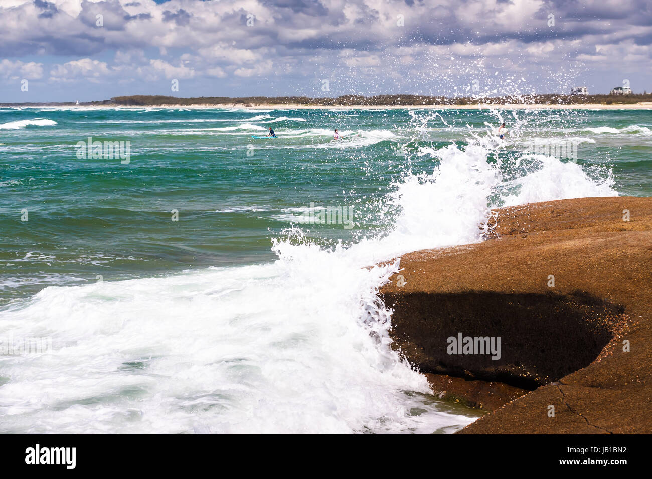 The surfers came early to catch the perfect wave in the beach in ...