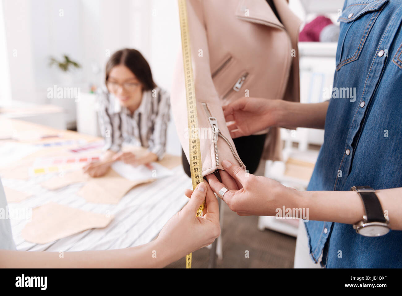 Sewing production hands master hi-res stock photography and images - Alamy