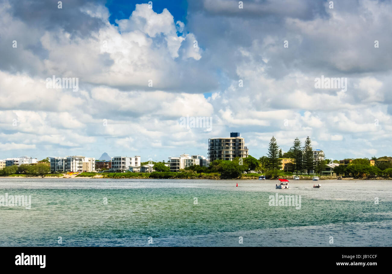 People enjoying a warm day at the beach in the beautiful town of ...