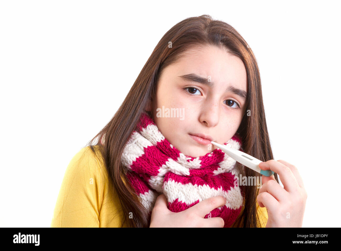 A young girl is sick and having her temperature taken Stock Photo - Alamy
