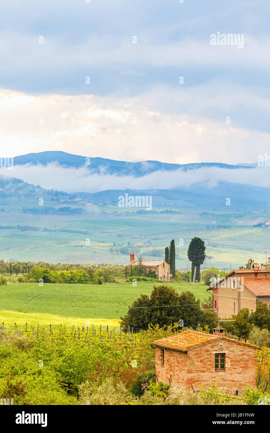 Farm with garden in a rolling countryside in Italy Stock Photo - Alamy