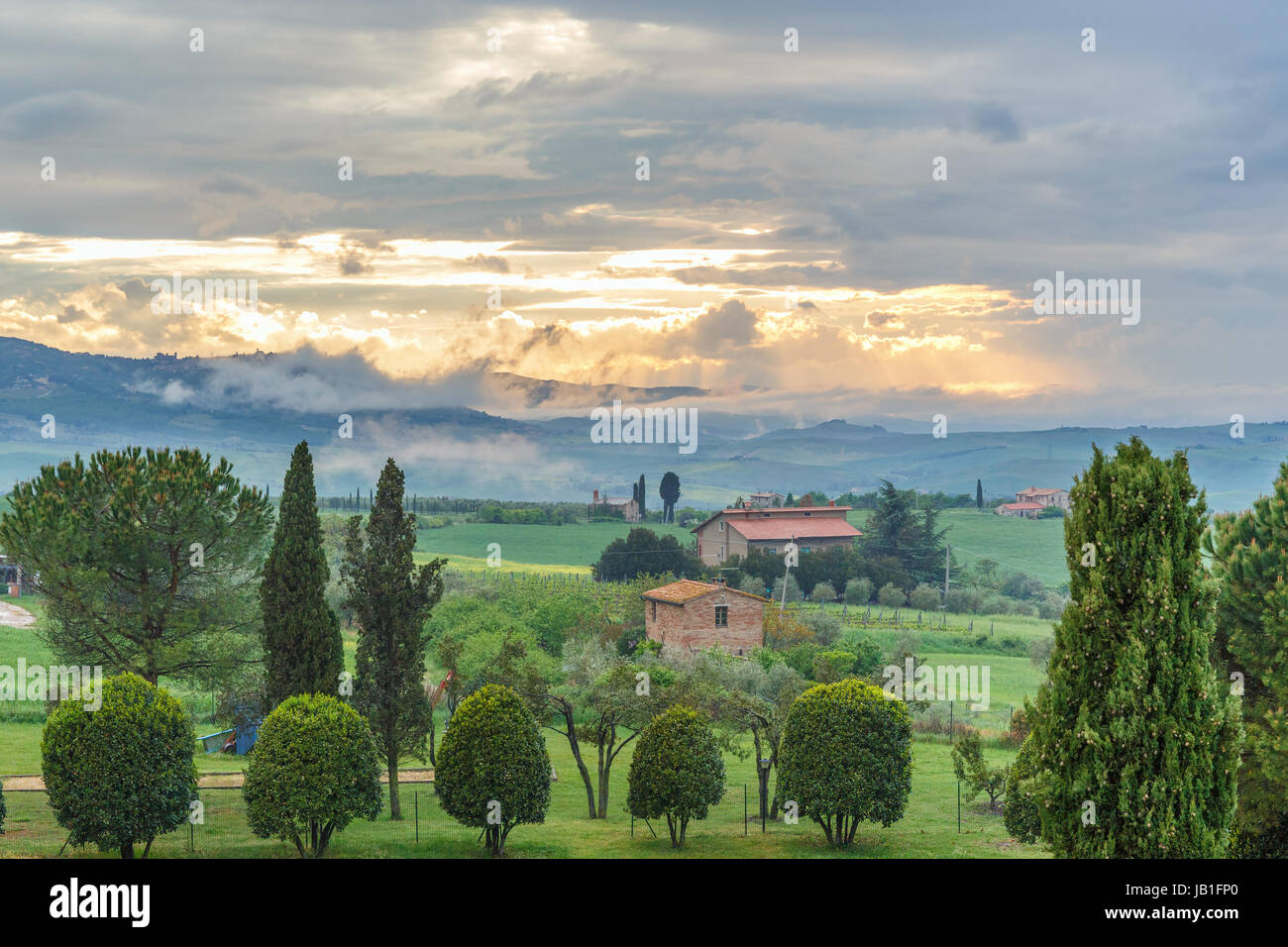Landscape view with sunset over Tuscany in Italy Stock Photo - Alamy