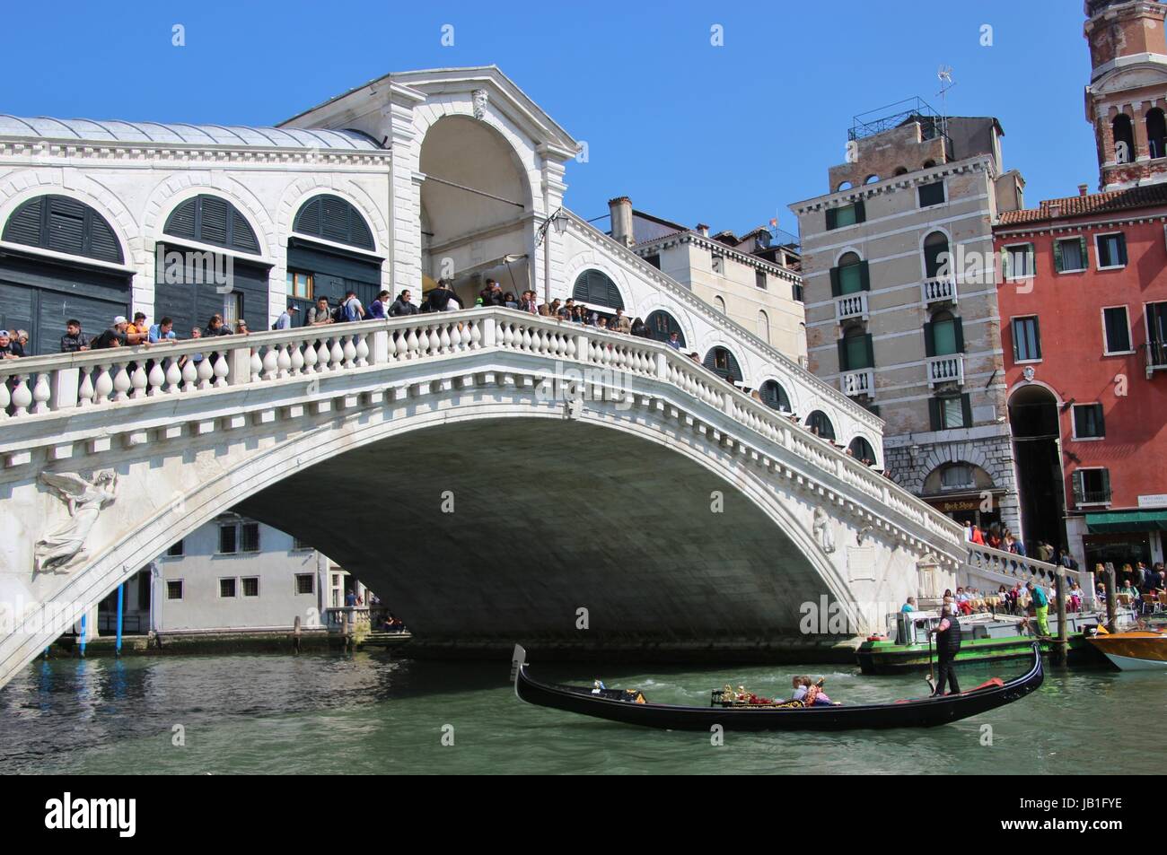 The Rialto bridge in Venice, Italy, Europe. Erected in 1591. It spans ...
