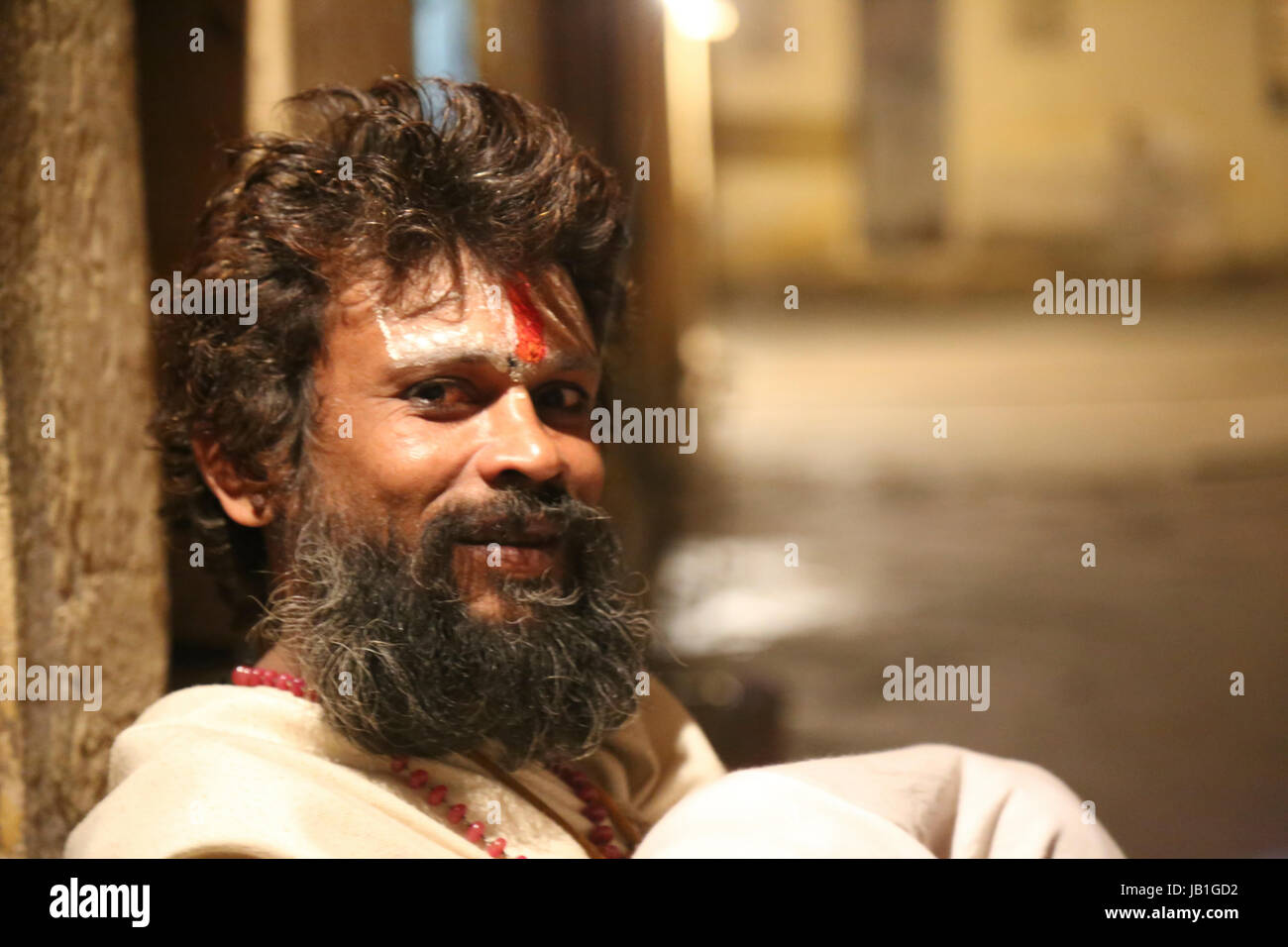 Guru, Saadhu (Holy man) looking at a Hindu temple in Dausa, India Stock ...