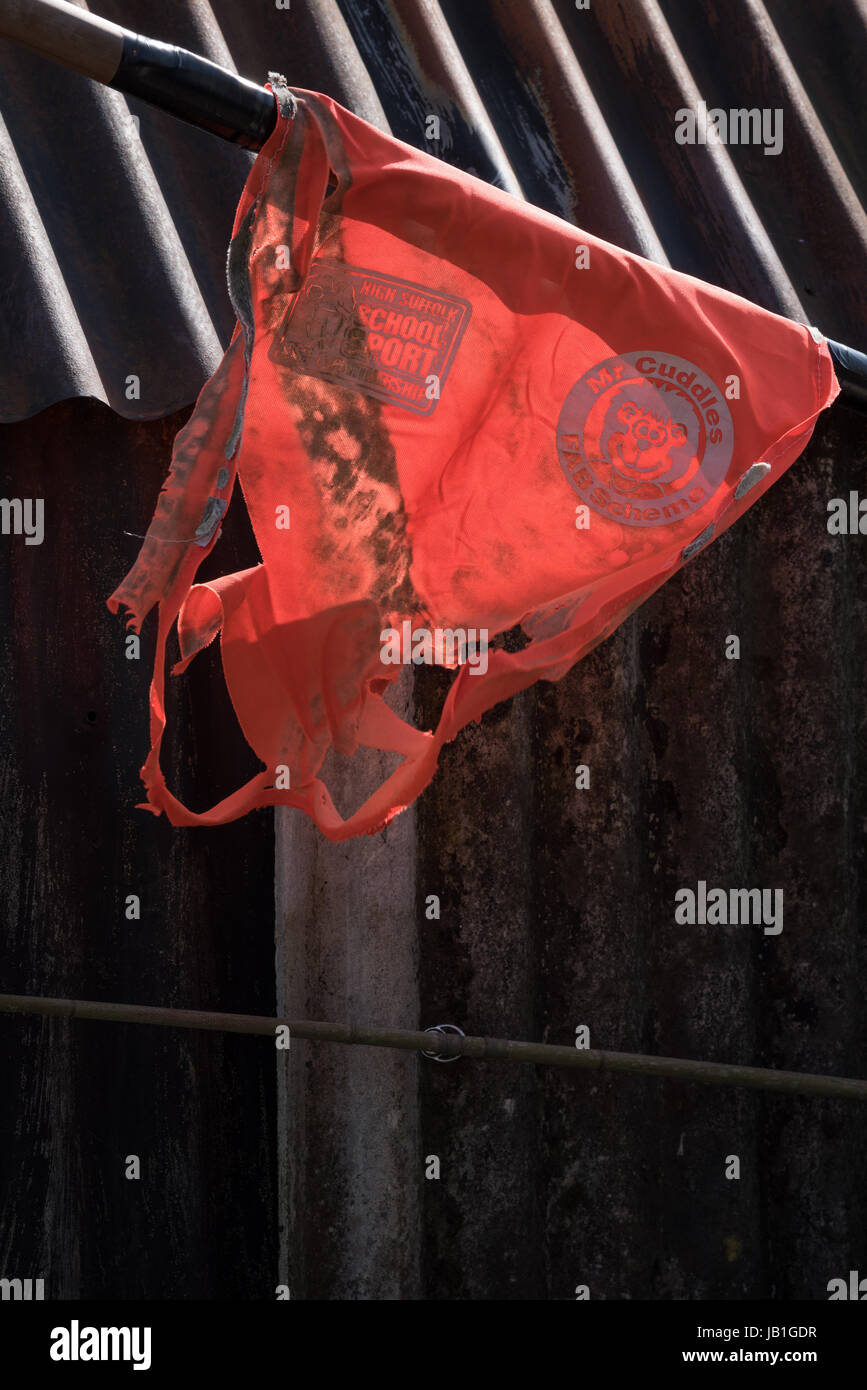 Torn red flag hi-res stock photography and images - Alamy