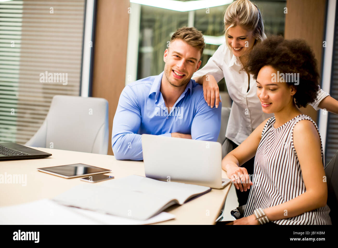 Group of young multiracial people working in the modern office Stock ...