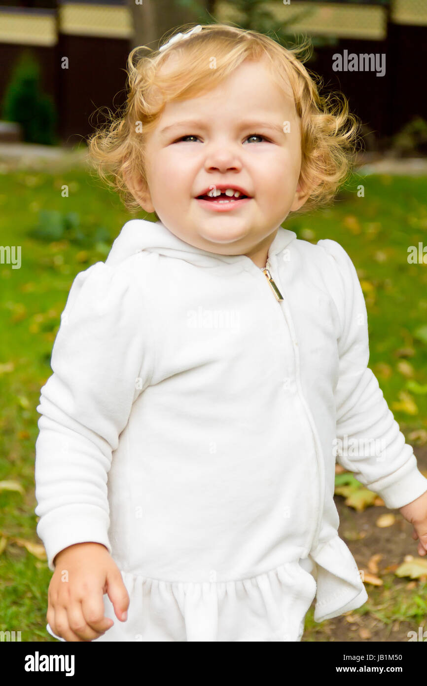 Photo of beautiful cute smiling infant girl Stock Photo - Alamy