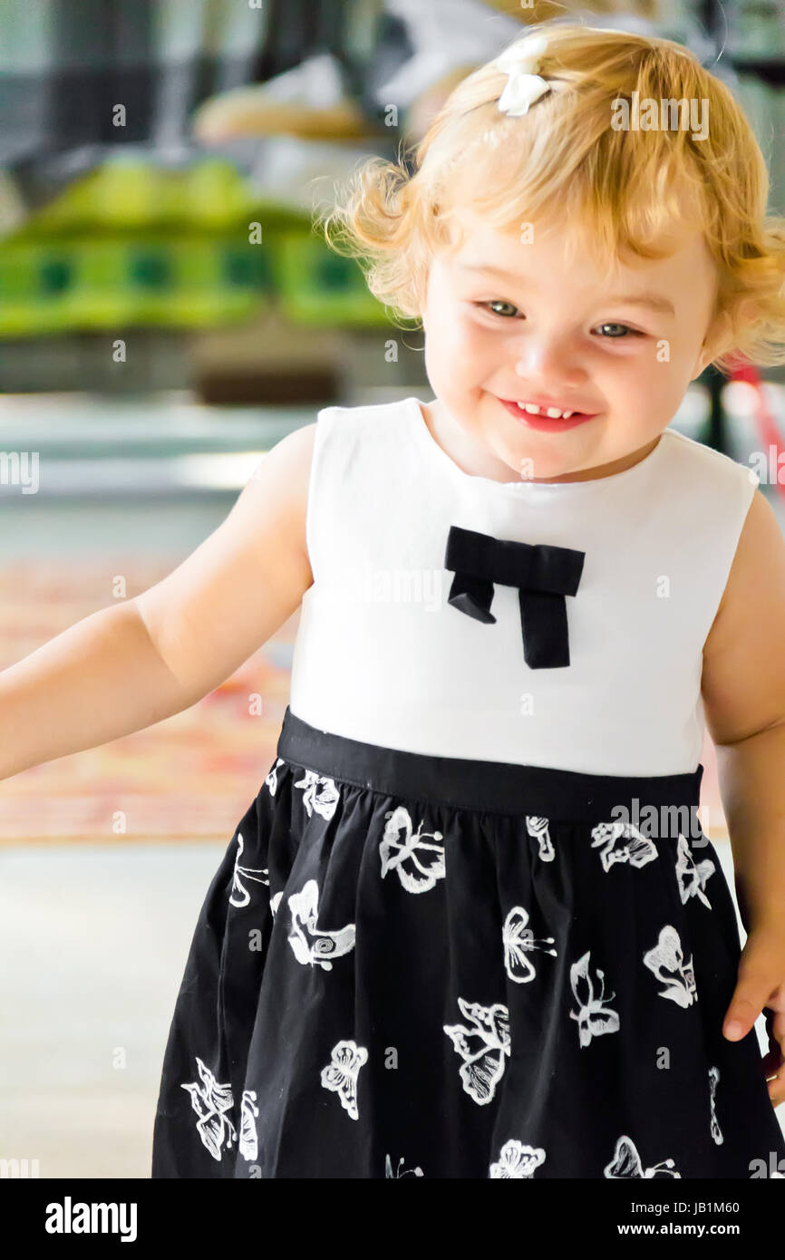 Photo of beautiful cute smiling infant girl Stock Photo - Alamy