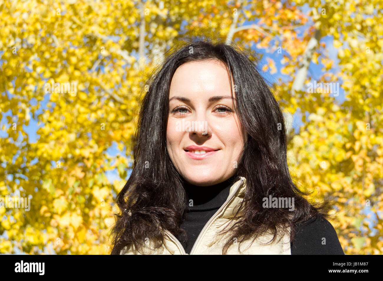 Photo of beautiful young brunette in autumn Stock Photo - Alamy