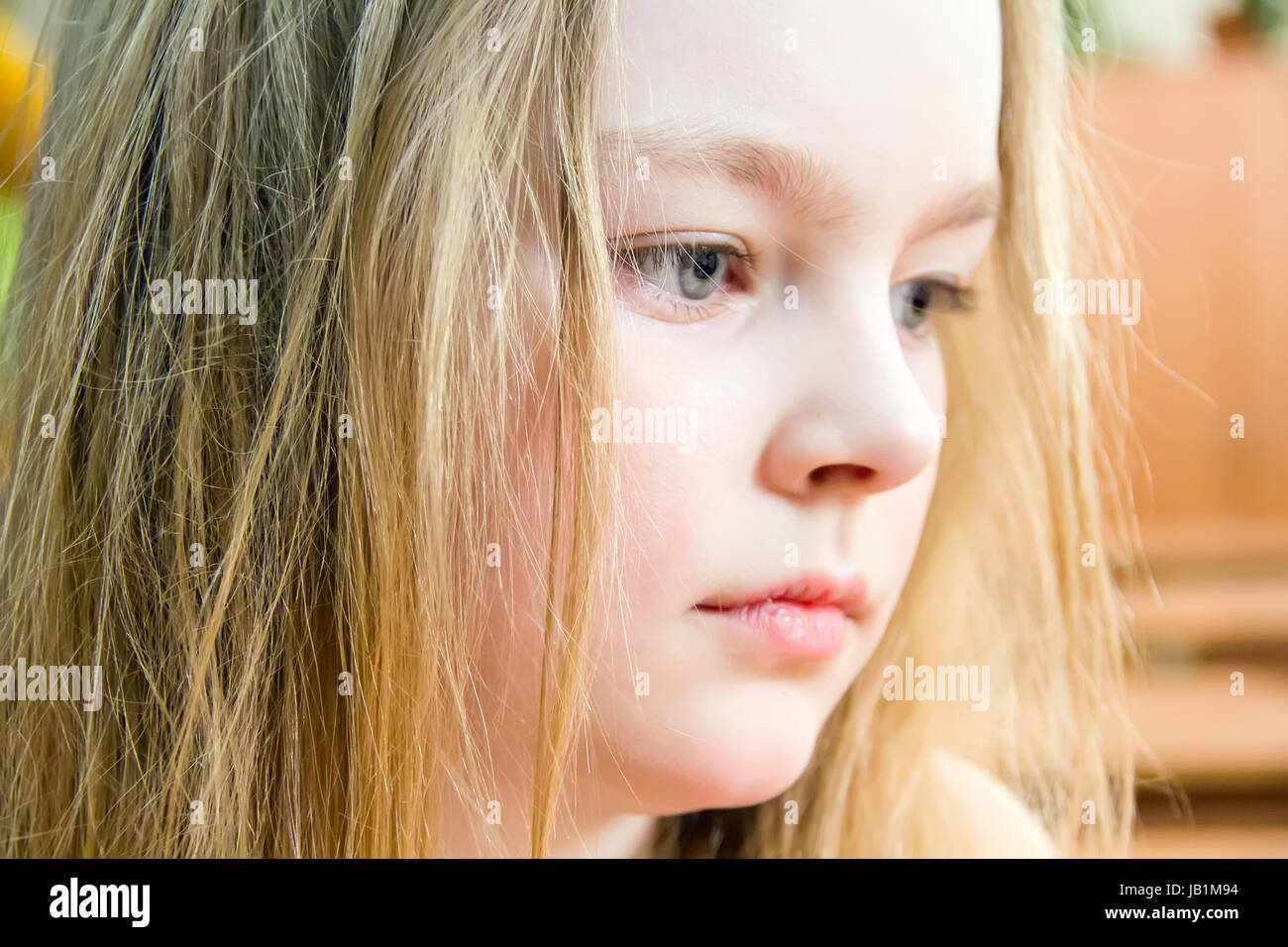 Profile of cute girl with blond hair Stock Photo - Alamy