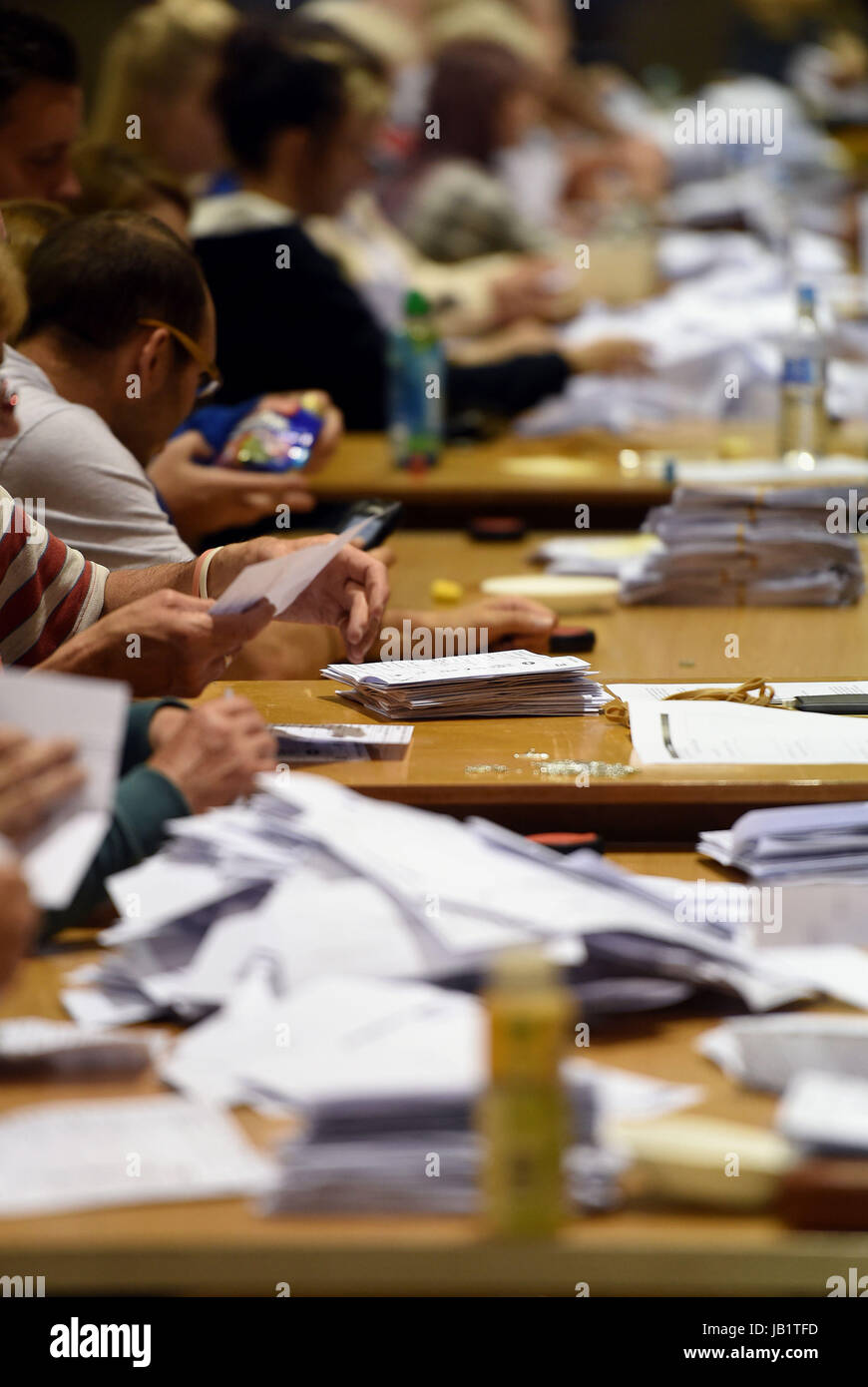 Election staff count ballot papers for the General Election, at the ...