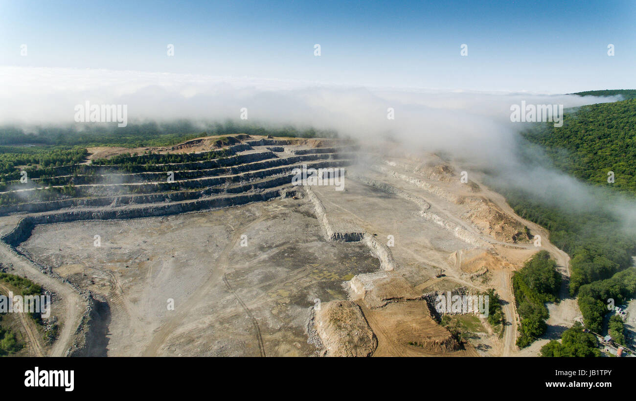 Stone quarry. Aerial view over the building materials processing ...