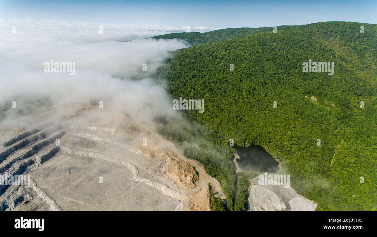 Stone quarry. Aerial view over the building materials processing ...