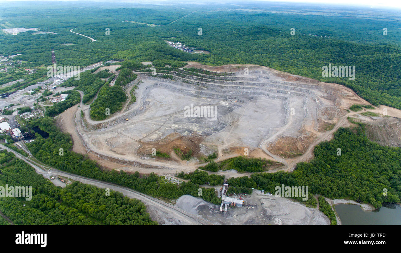 Stone quarry. Aerial view over the building materials processing ...