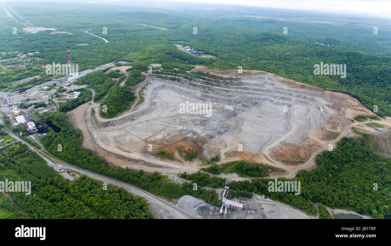 Stone quarry. Aerial view over the building materials processing ...