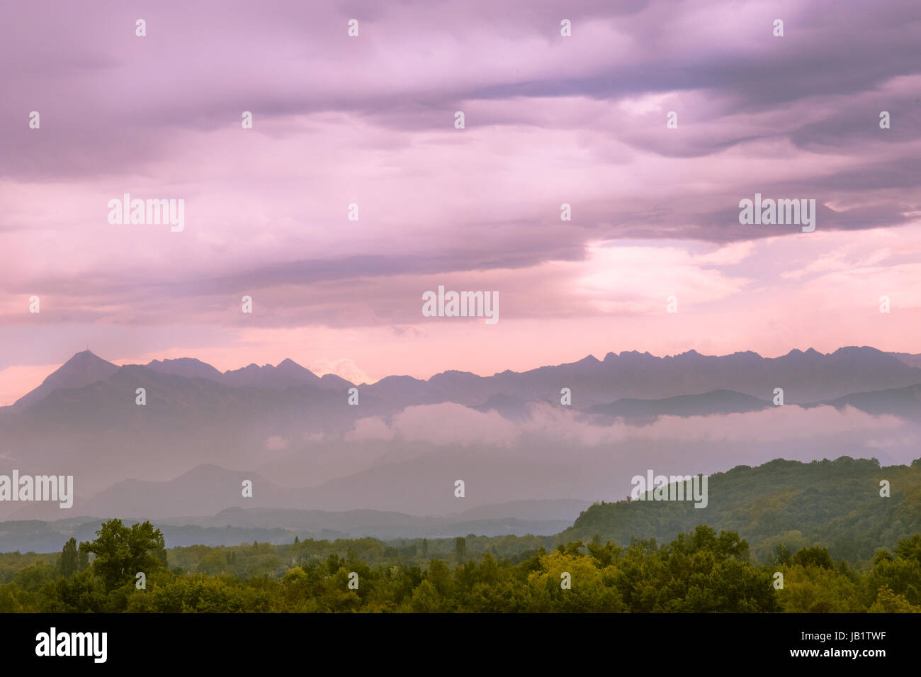A view of Pyrenees from France with dramatic clouds Stock Photo - Alamy