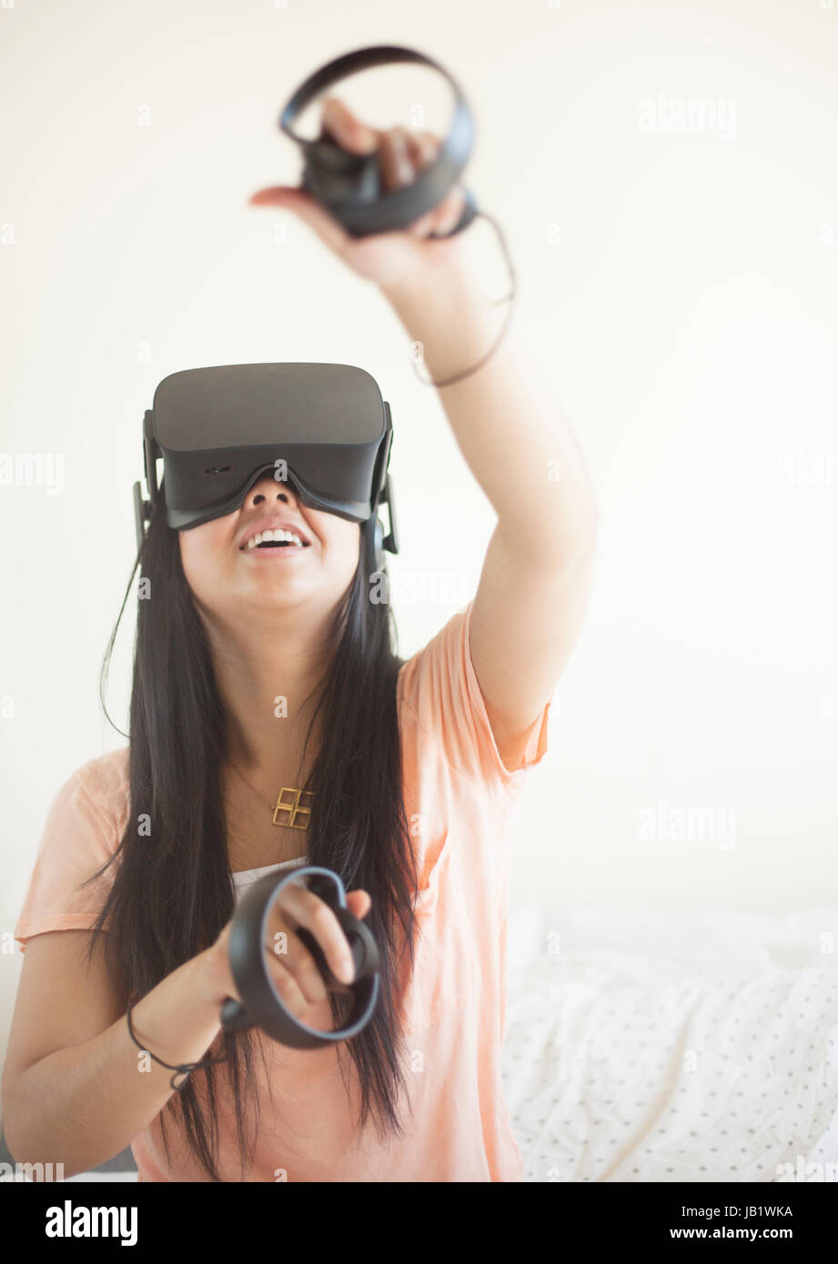Young Asian Woman Wearing Virtual Reality Headset Oculus Rift And