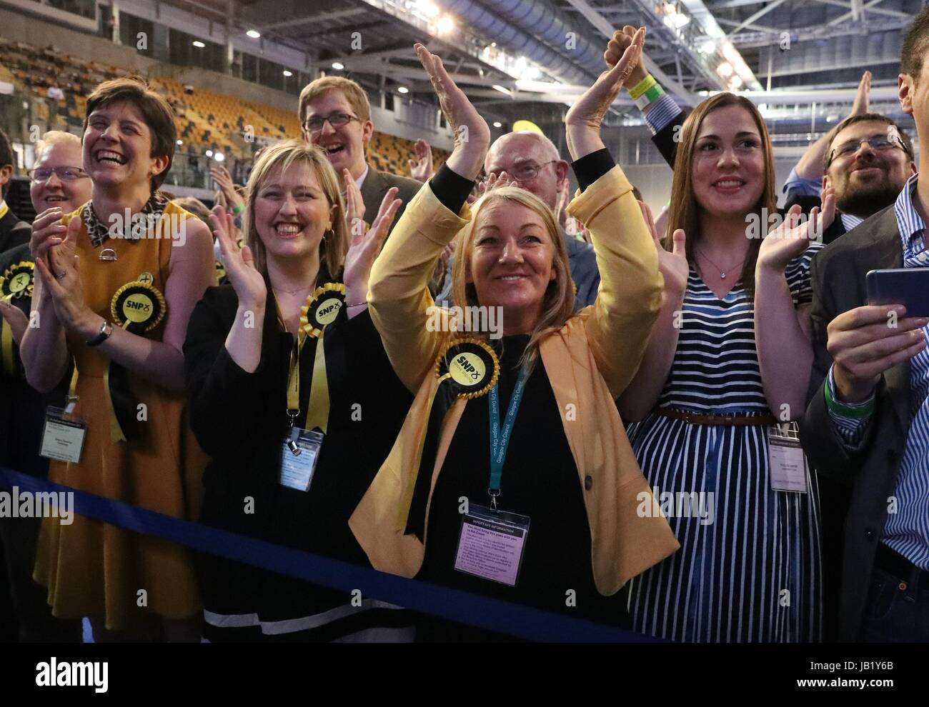 SNP supporters celebrate at the Emirates Arena in Glasgow, as counting ...