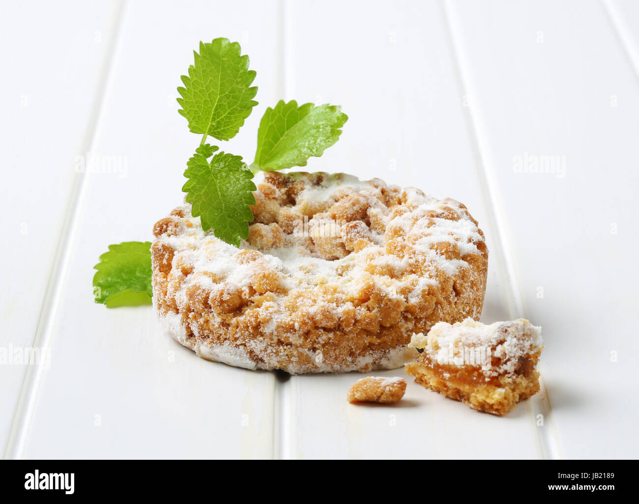 Apple crumble cookie dusted with icing sugar Stock Photo - Alamy
