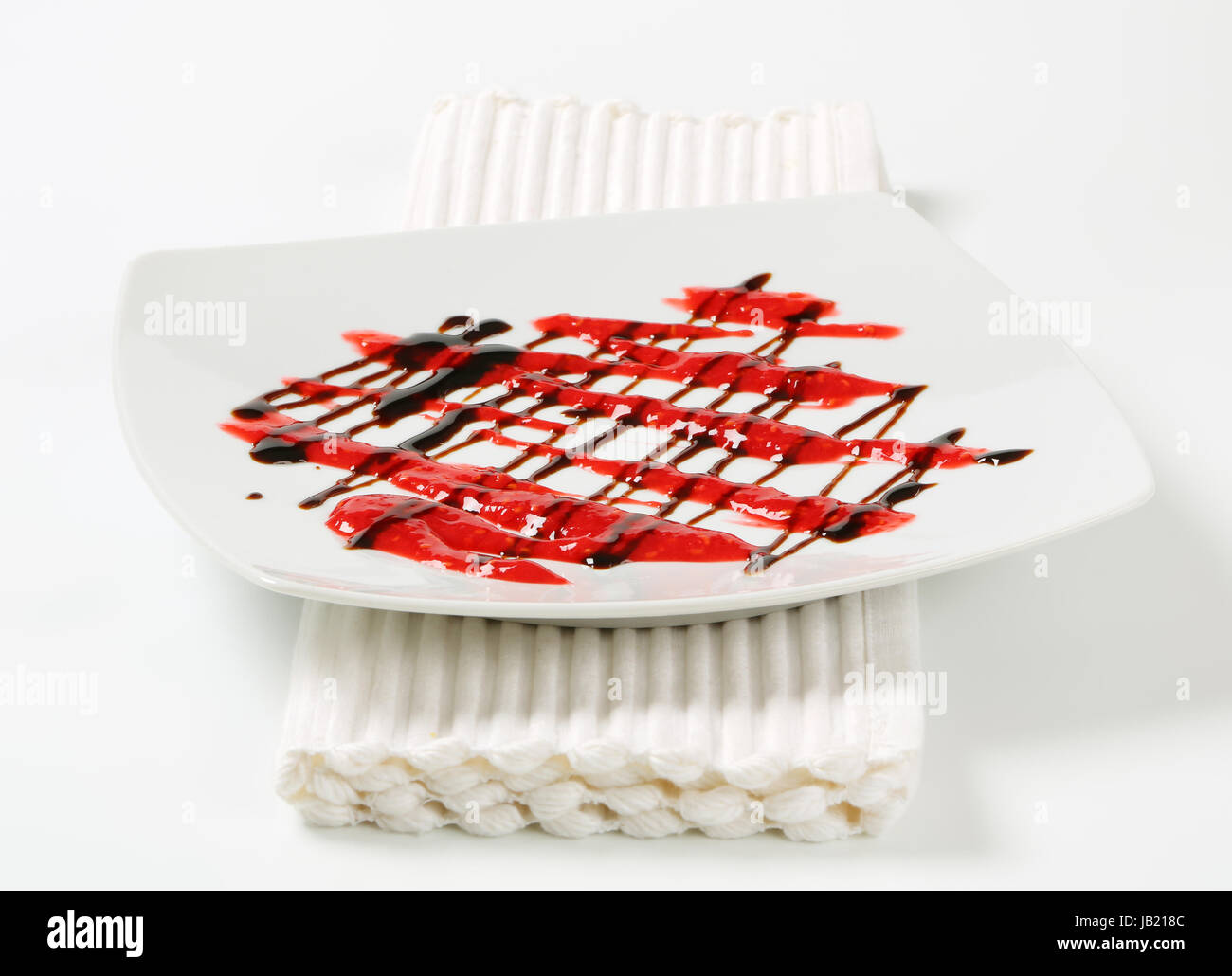 Strawberry sauce drizzle on white hi-res stock photography and images ...
