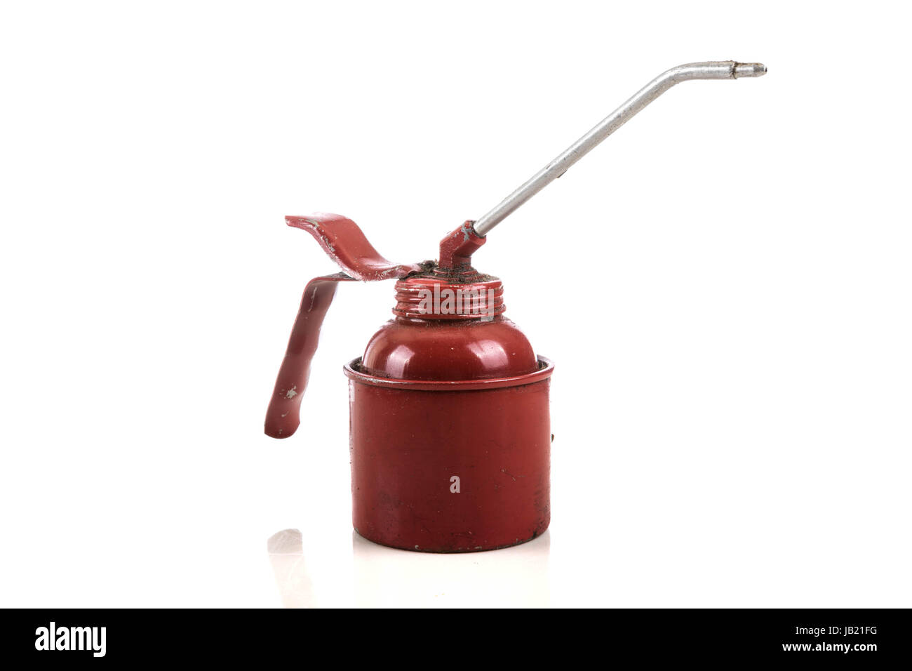 Red oil can isolated on a white background Stock Photo - Alamy