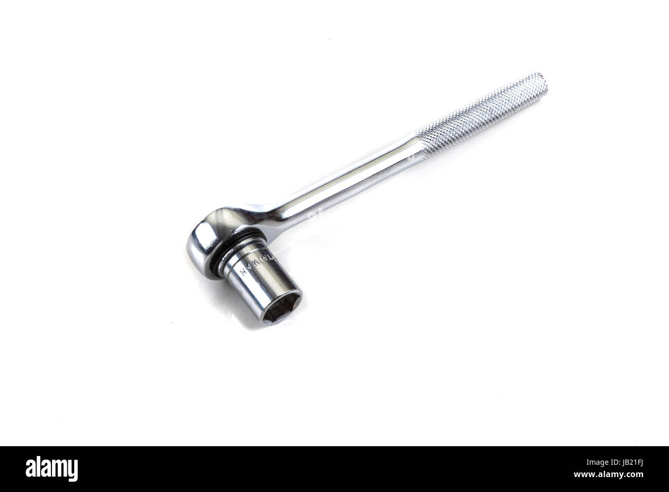 Ratchet fitted with a socket isolated on white background Stock Photo ...