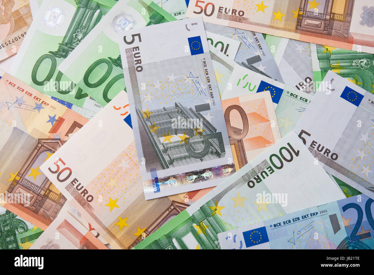 Many euro banknotes making european currency background Stock Photo - Alamy