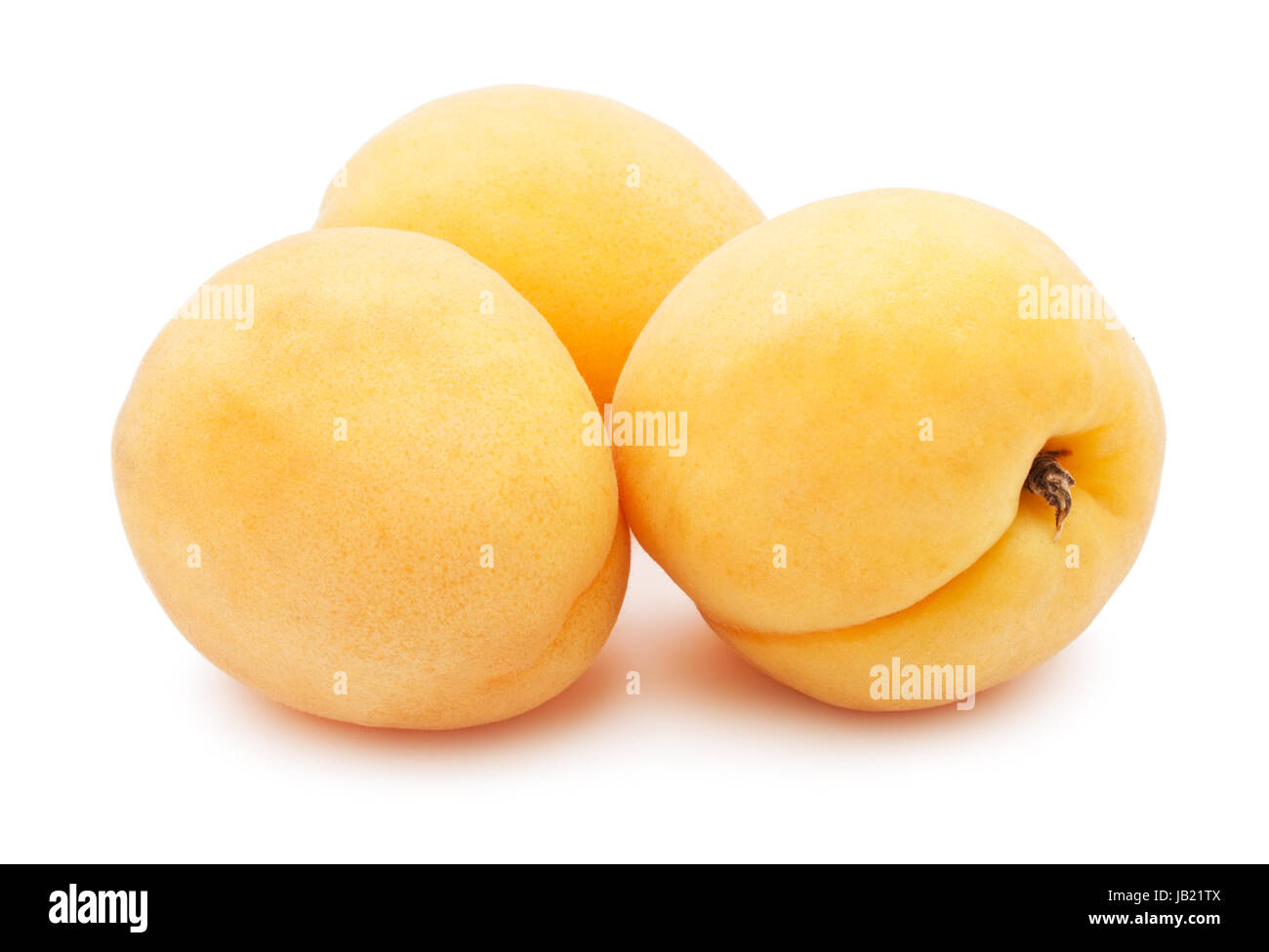 Fresh sweet apricots isolated on white background Stock Photo - Alamy